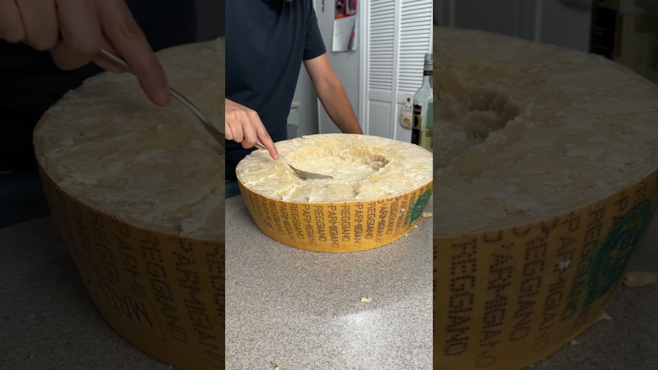 Making pasta in a cheese Wheel - Italian Food